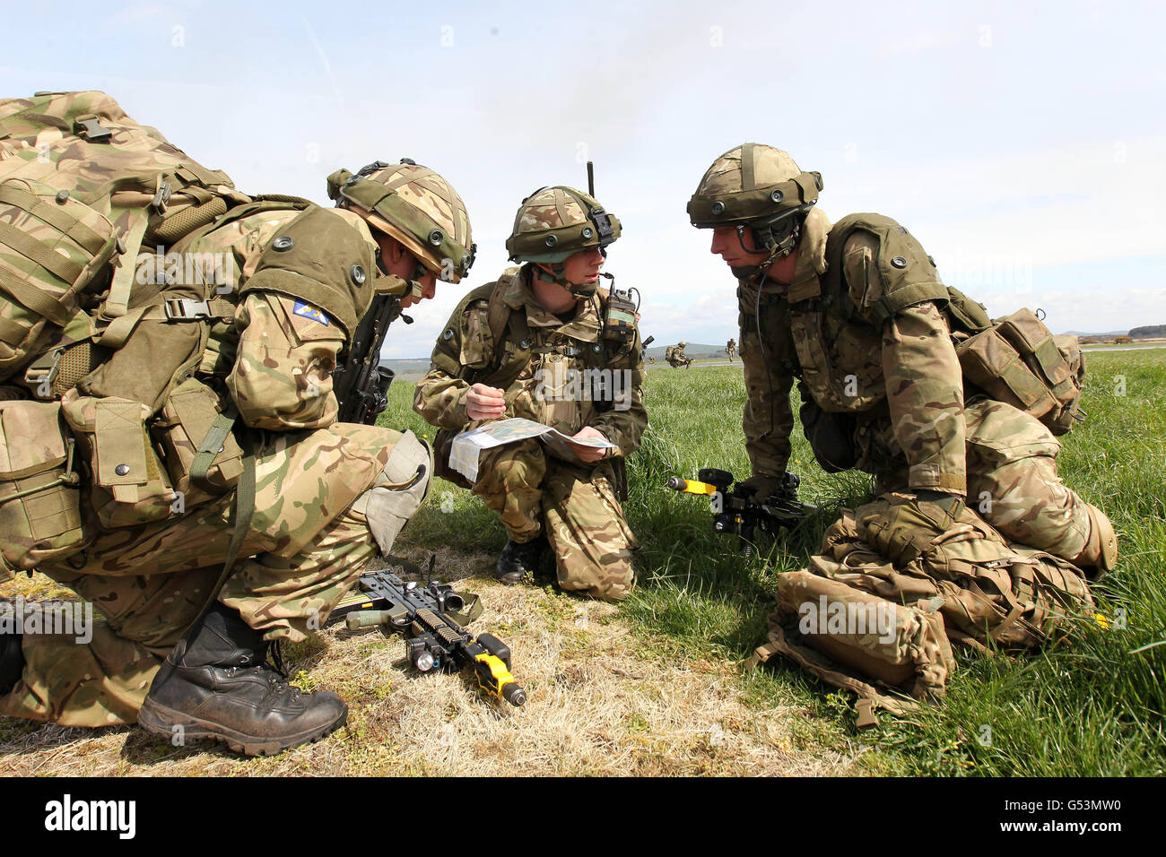 Soldiers from 5 Scots look at a map during training at West Freugh ...