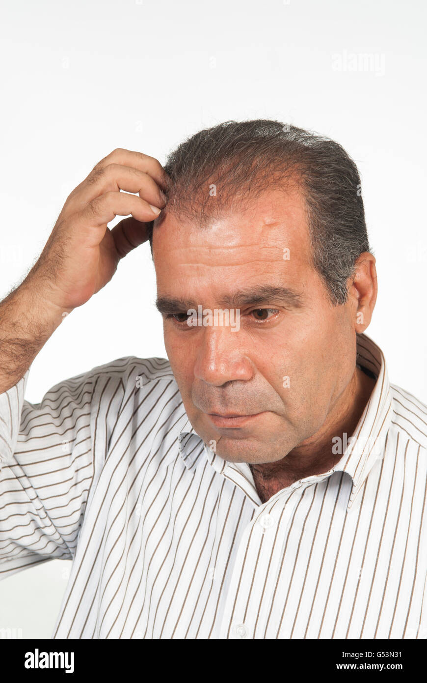 Man scratching his head Stock Photo - Alamy