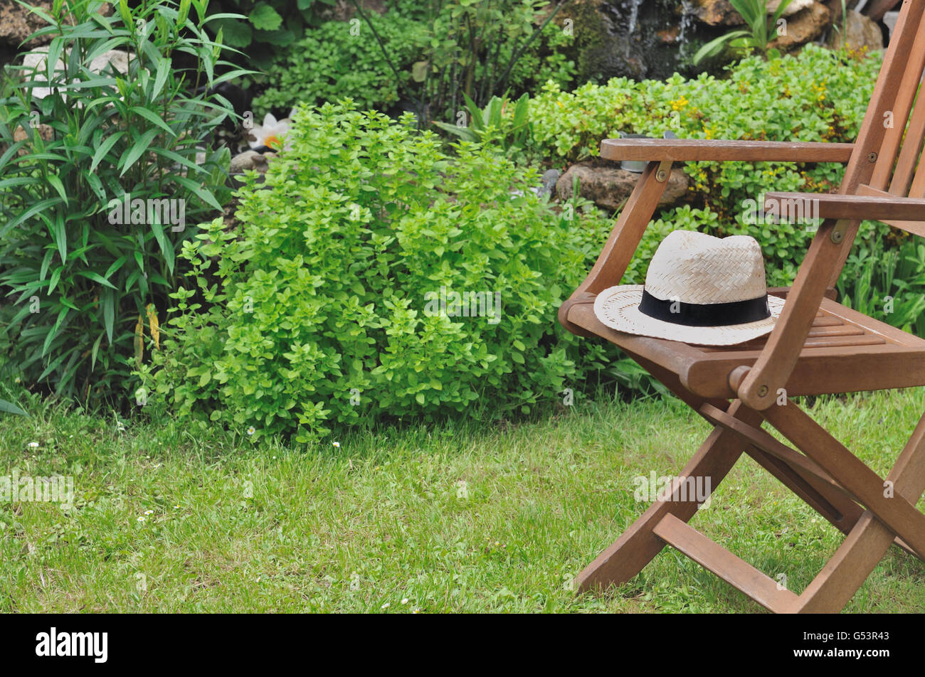 Straw hat chair hi-res stock photography and images - Alamy