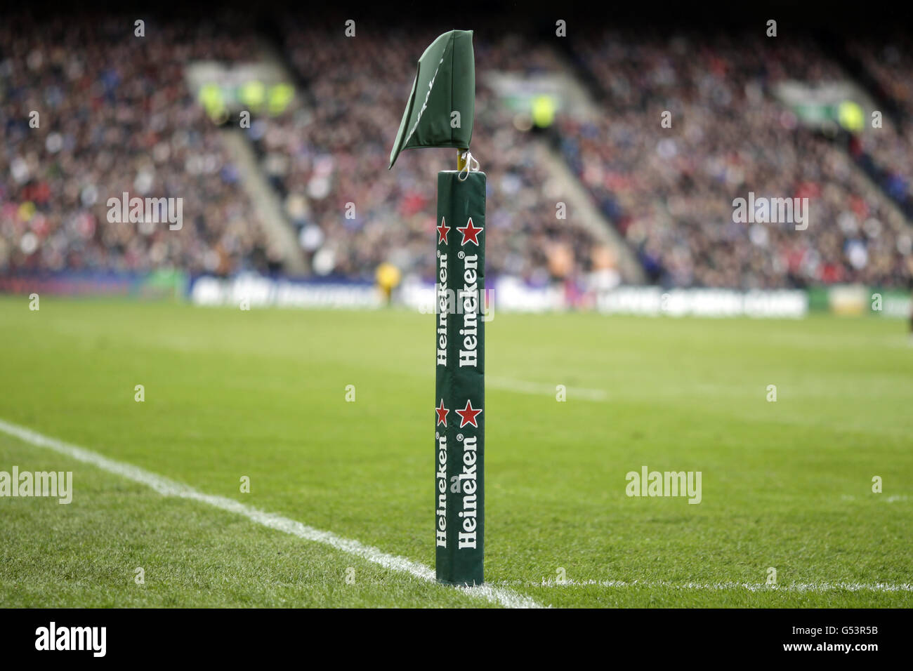 Detail of heineken branding on the flag posts at murrayfield stadium hi ...