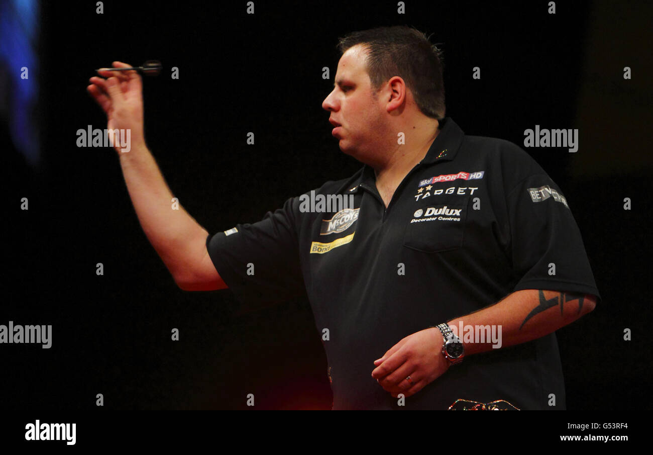 Adrian Lewis in action against Phil Taylor during the McCoys Premier ...