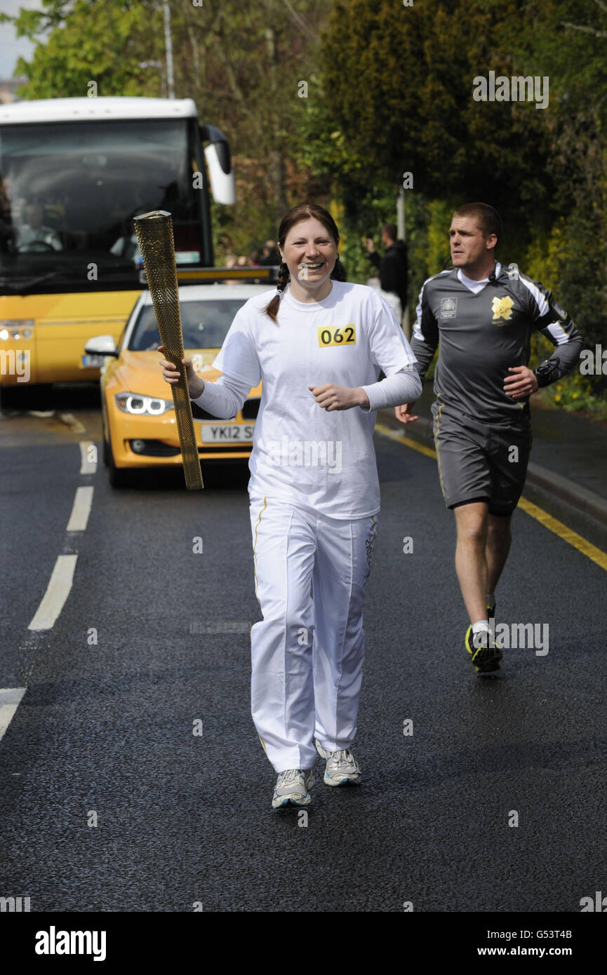 Rebecca Rimmington (062) carries the torch through Melton Mowbray ...