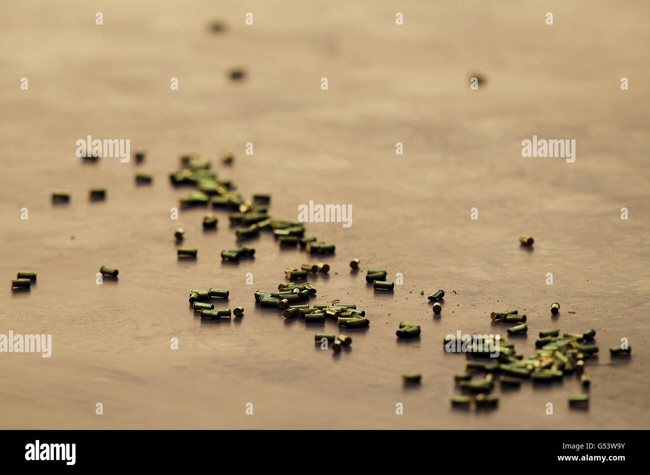 Used bullet casings litter the floor during the women's 25m pistol ...