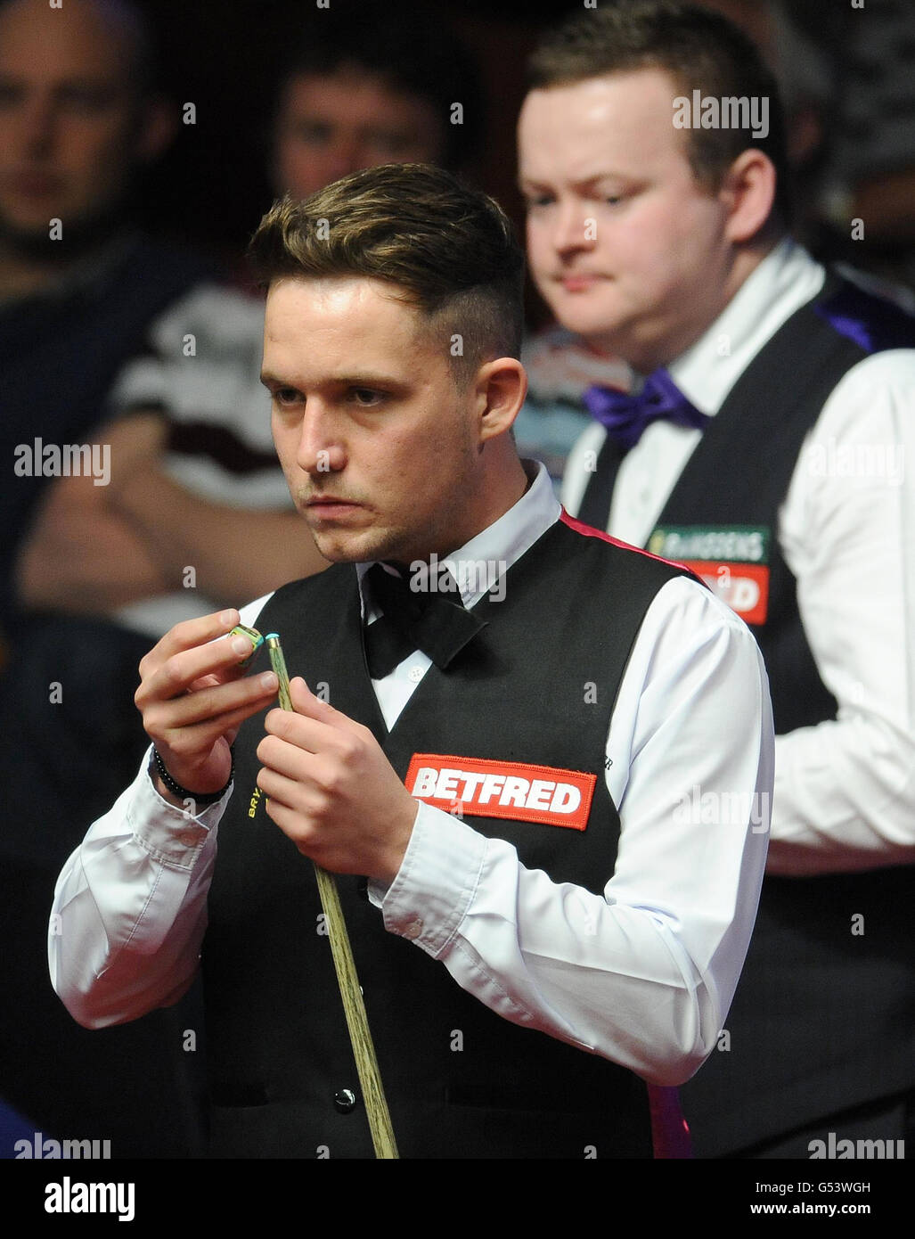 Wales' Jamie Jones (left) and England Shaun Murphy during their first ...