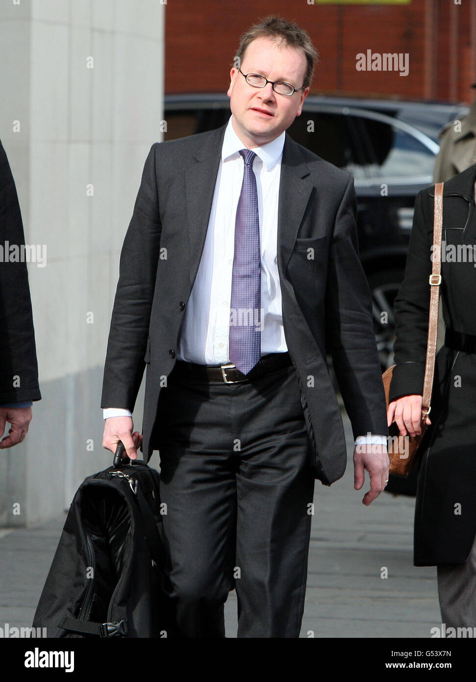 Northern Ireland Attorney General John Larkin arrives at Belfast High ...