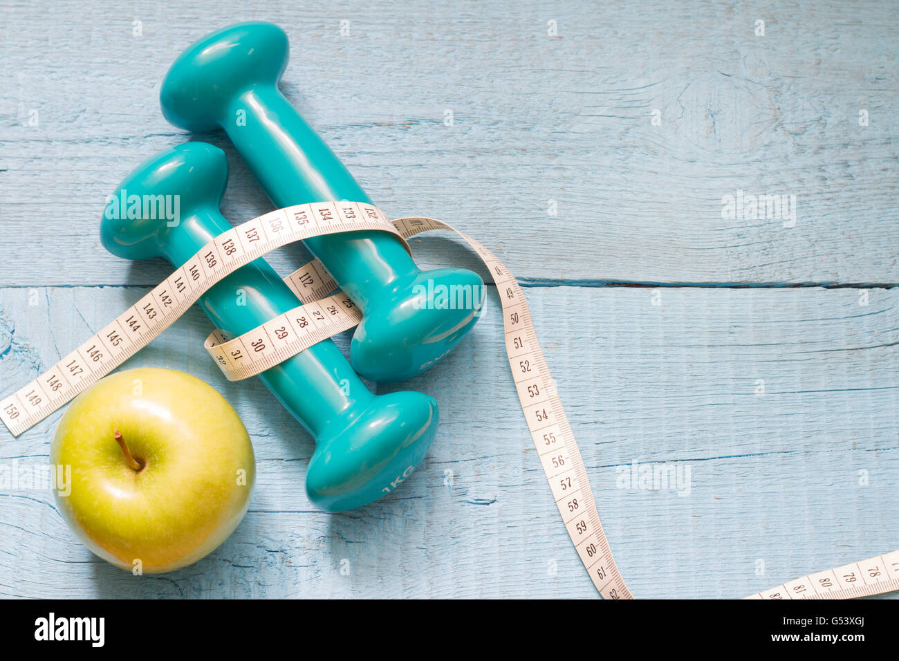 Fitness and diet abstract concept with dumbbells closeup Stock Photo ...