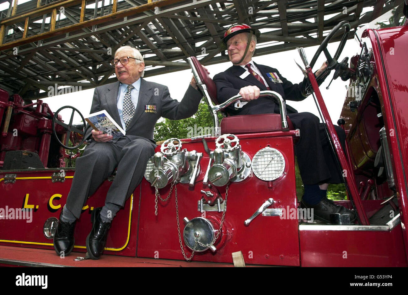 Colin Perry, the author of book entitled Boy in the Blitz, left, with ...