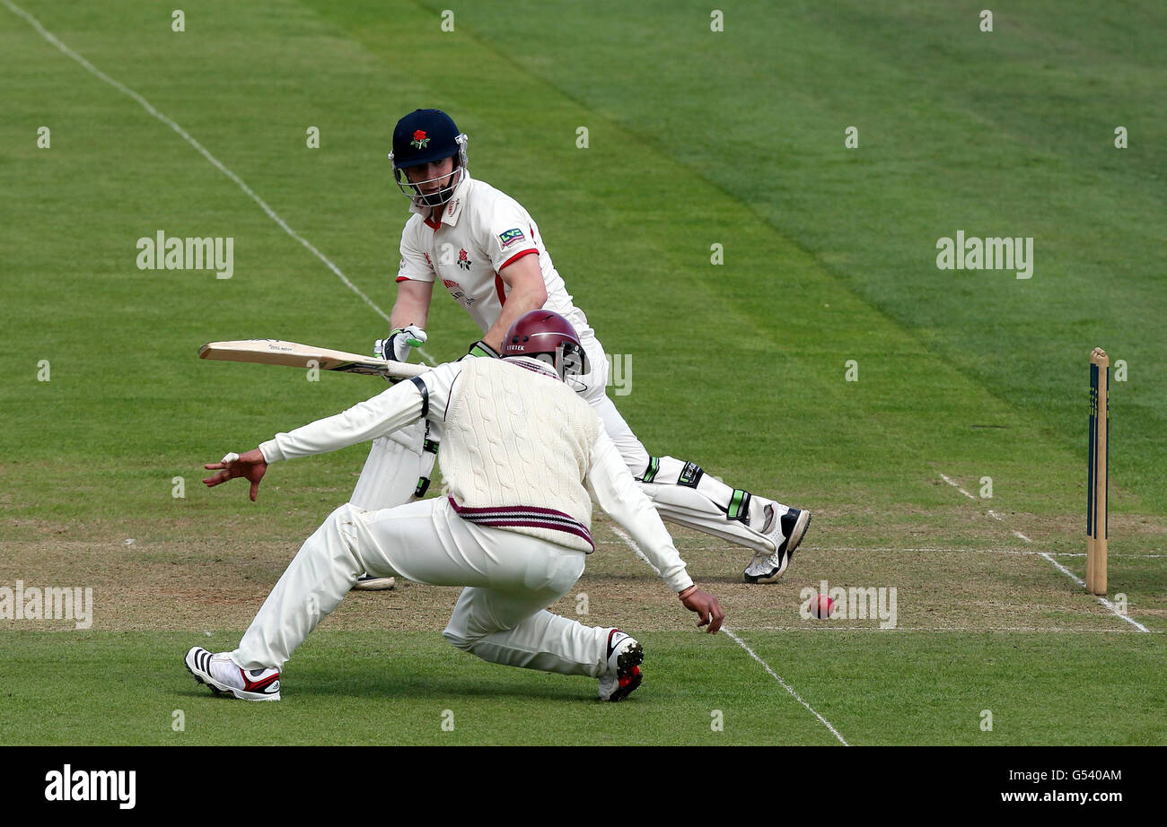Lancashire's Steven Croft flicks the ball past Somerset's Arul Suppiah ...
