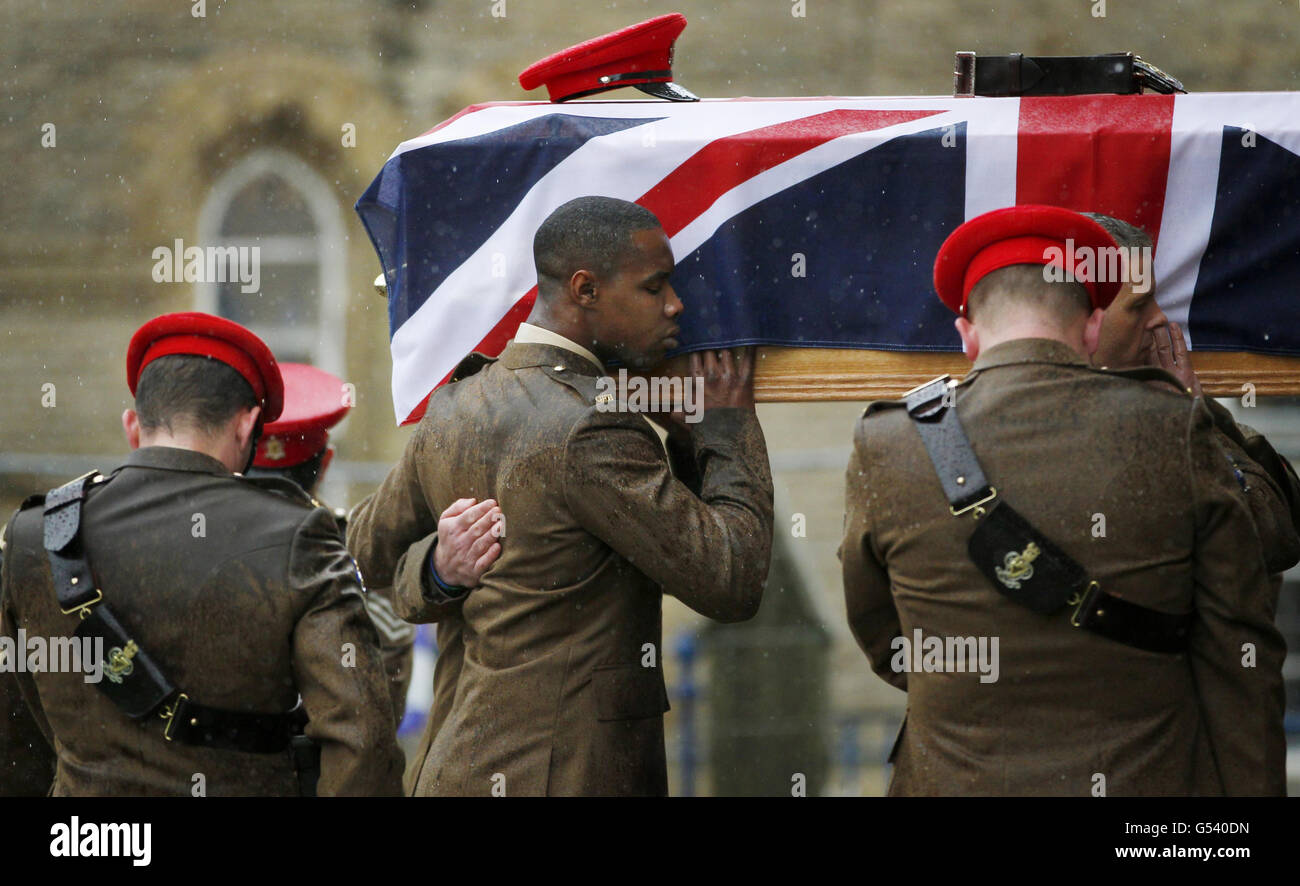 The coffin of Corporal Jack Stanley is carried into Holy Trinity Church ...