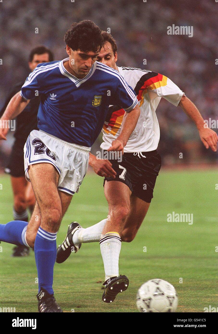 (L-R) Argentina's Juan Simon battles for the ball with Germany's Pierre ...