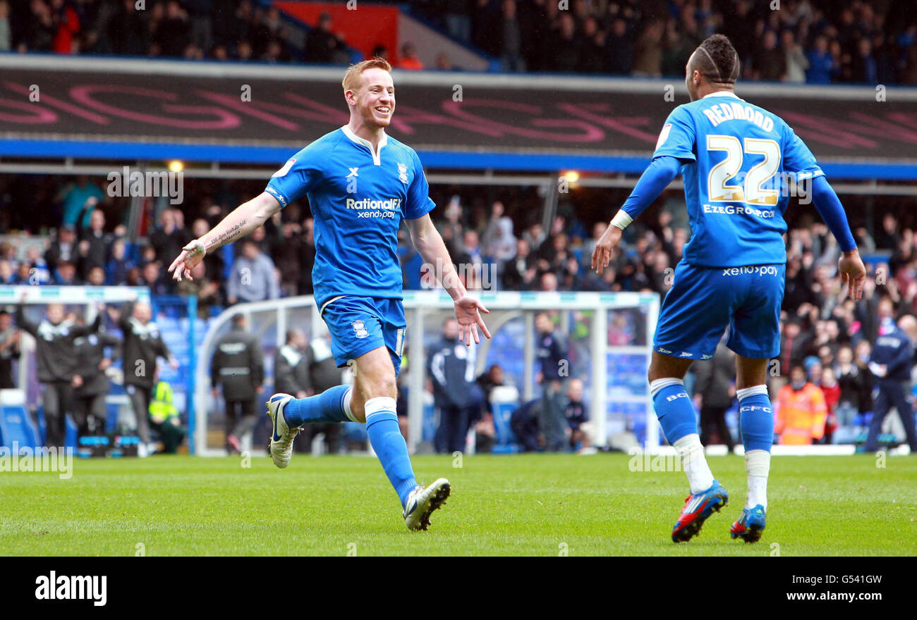 Birmingham City's Adam Rooney (left) celebrates scoring his sides ...