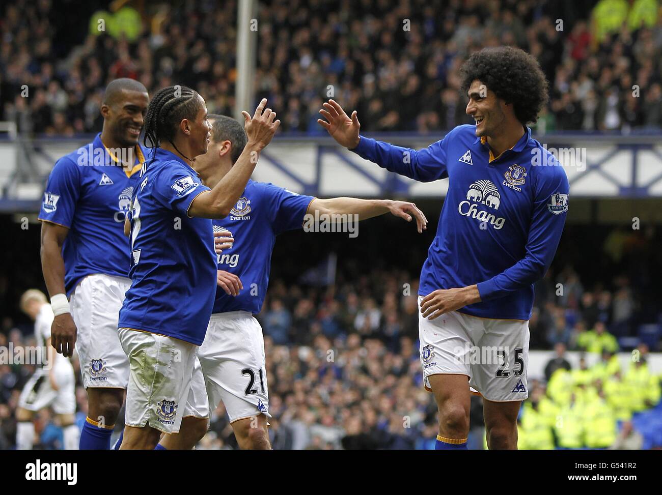Everton's Marouane Fellaini celebrates scoring his side's second goal ...
