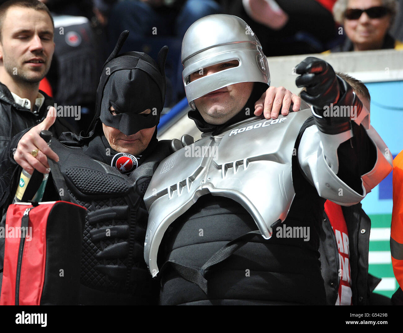 Batman and robocop team up to support charlton athletic hi-res stock ...