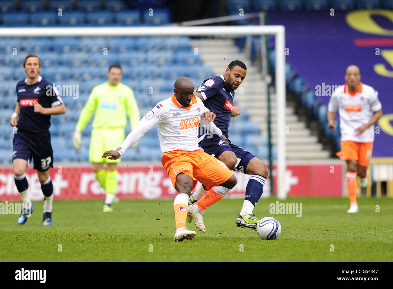 Millwall's Liam Trotter (right) and Blackpool's Lomana Tresor LuaLua ...