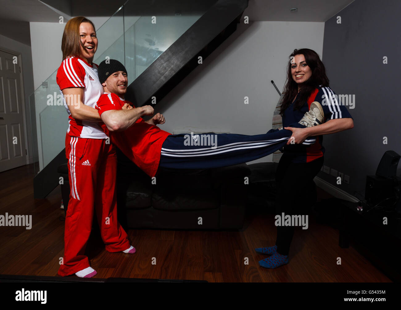 Great Britain's Gareth Evans is lifted up by Helen Jewell and Hannah ...