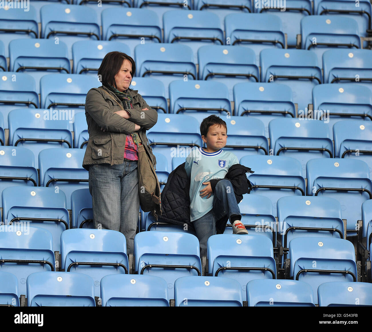 Two dejected fans at the end of the game hi-res stock photography and ...