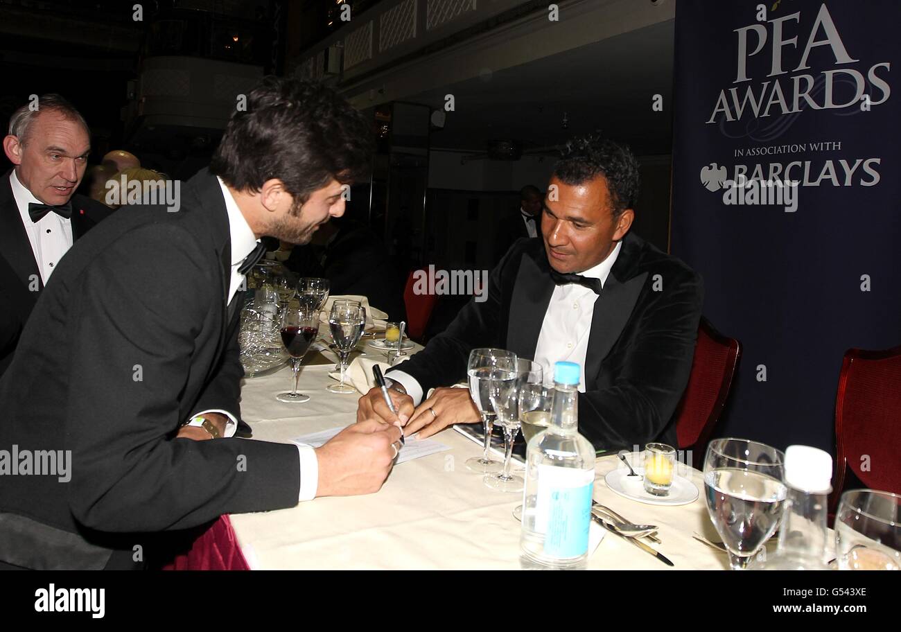 Ruud Gullit signs an autograph for a guest at the 2012 PFA Player of ...