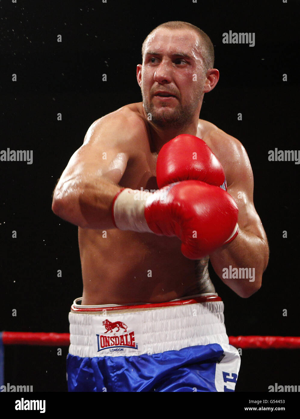 Jon Lewis Dickinson in action against Matty Askin during their ...