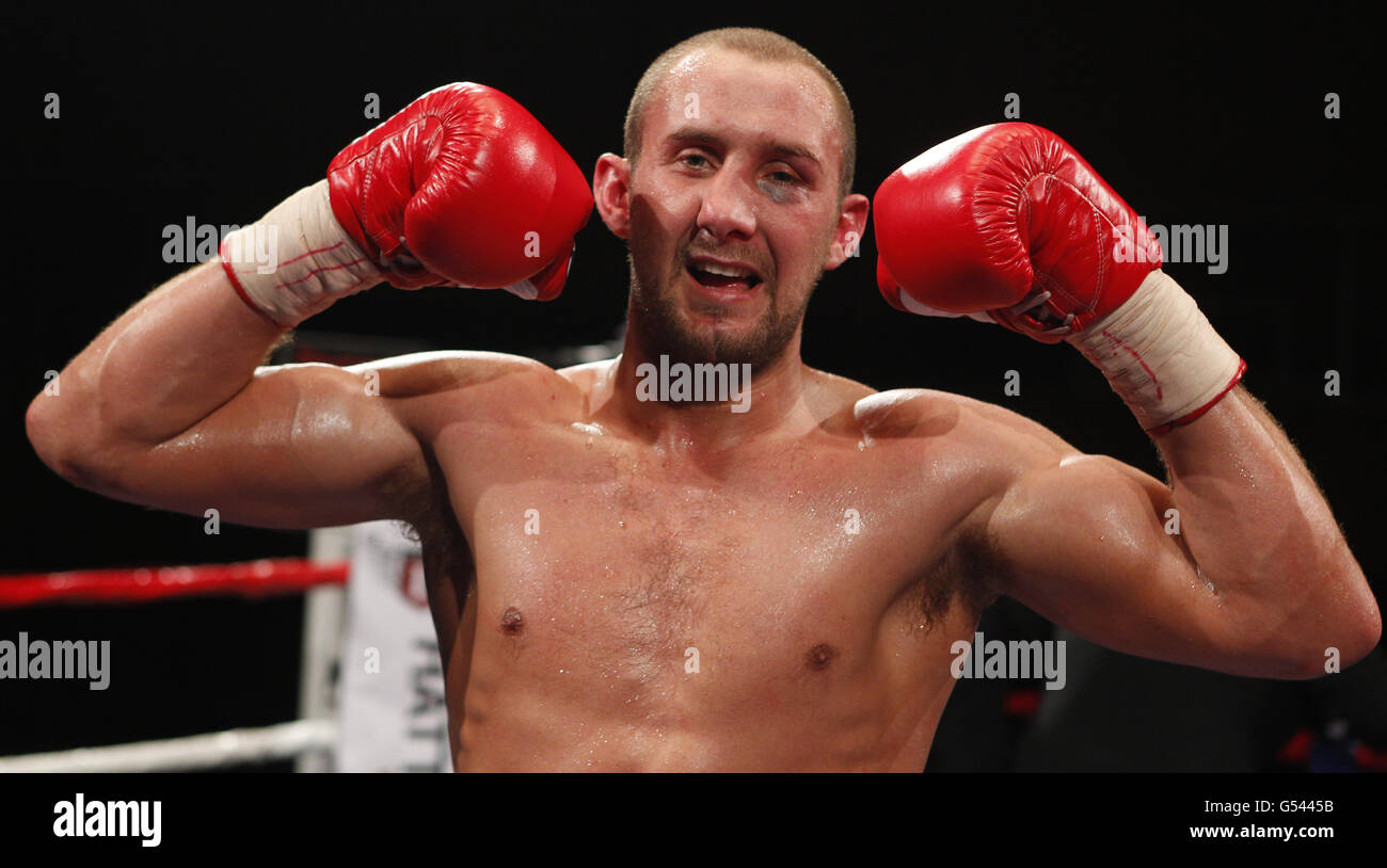 Boxing - Oldham Sports Centre. Jon Lewis Dickinson celebrates his ...