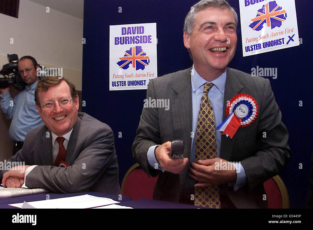 Ulster Unionist Leader David Trimble (L) with the party's candidate ...