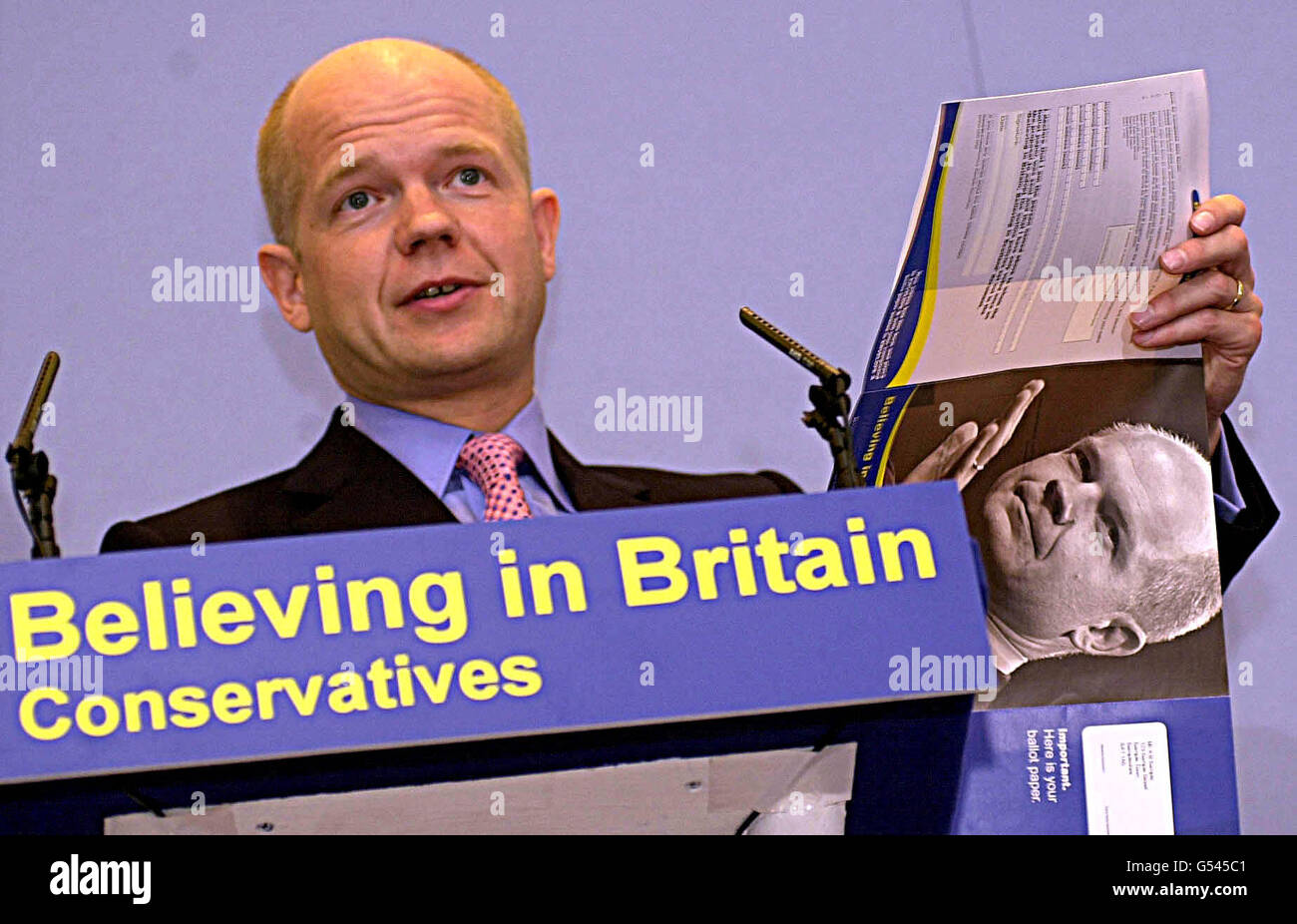 Conservative Party leader William Hague holds up Believing in Britain ...