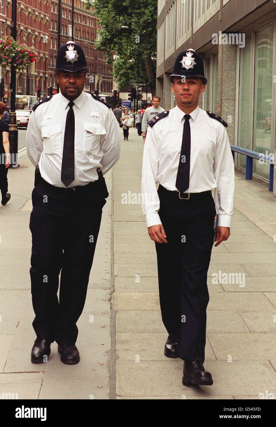 Two Metopolitan Police constables on patrol in central London. Police ...