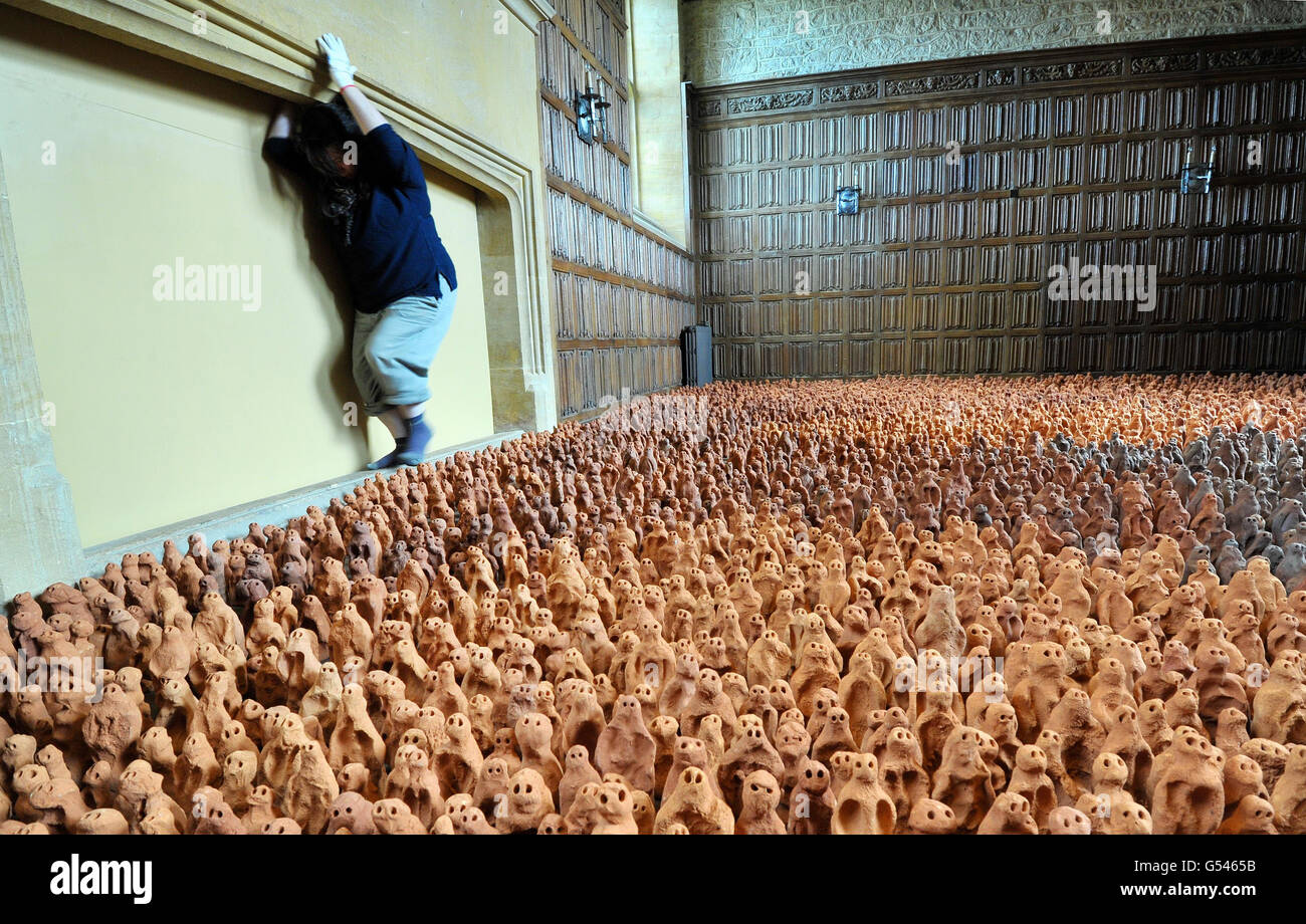 Local volunteer Deborah Westmancoat helps to set up Antony Gormley's ...