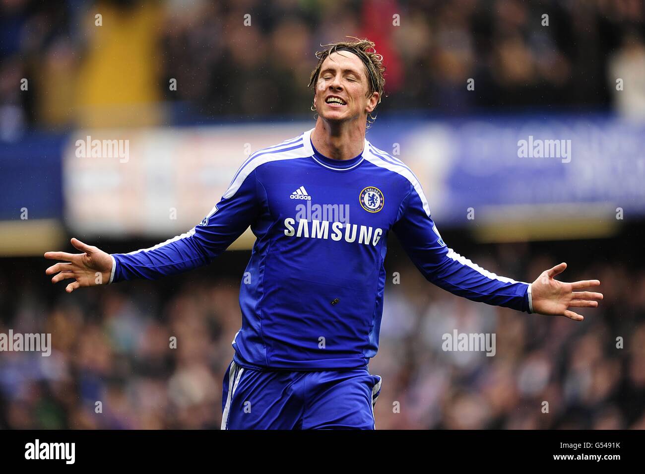 Chelsea's Fernando Torres celebrates scoring his side's fourth goal of ...