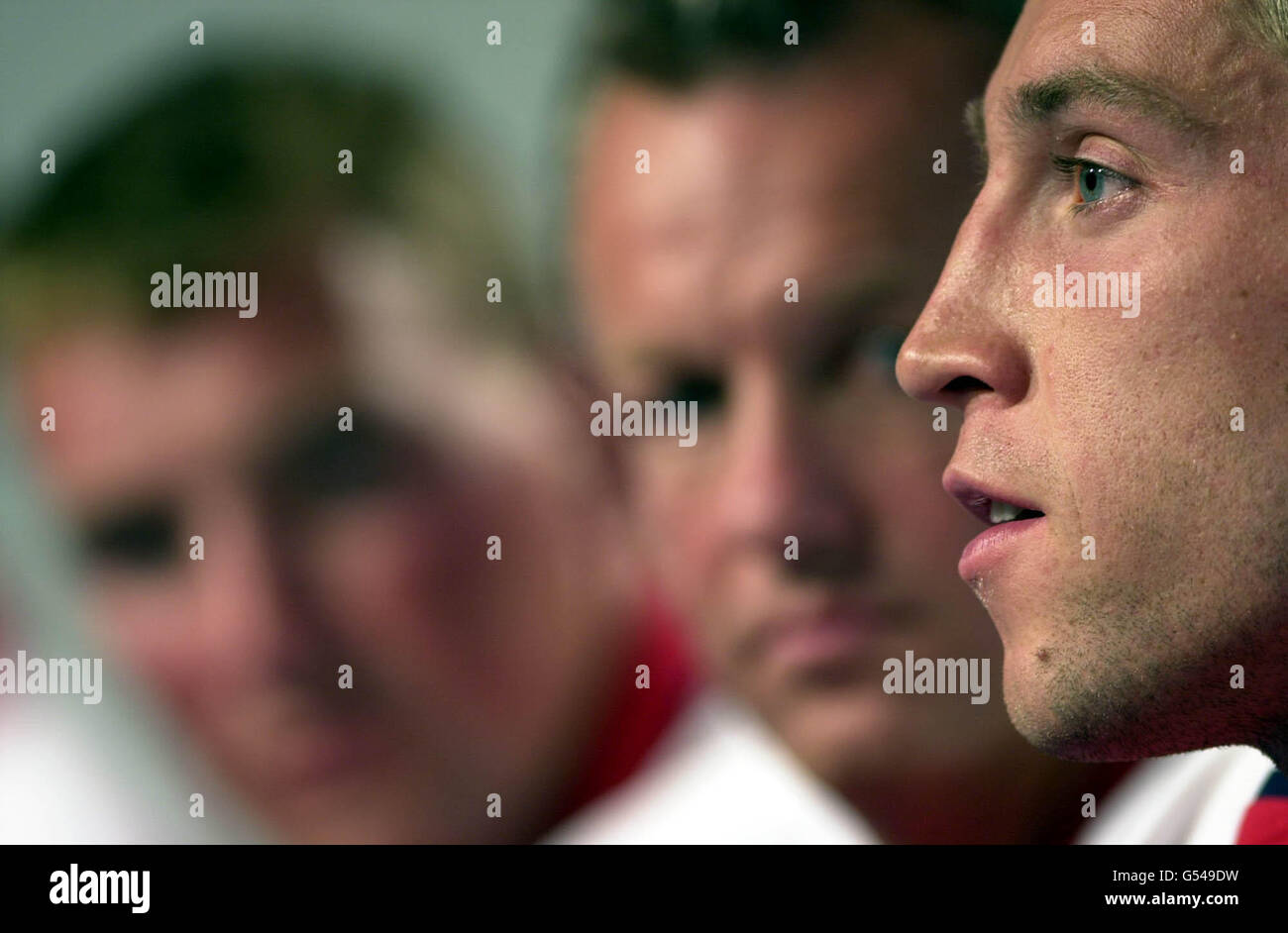 British swimmer Stephen Parry (right) talks to the press during a ...