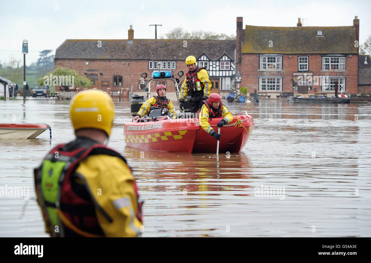 A team from Gloucester Fire and Rescue service scout the flooded areas ...