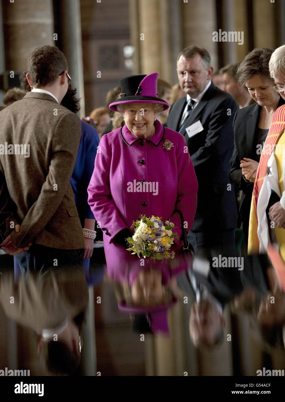 Queen Elizabeth II greets well-wishers as she takes a walkabout inside ...