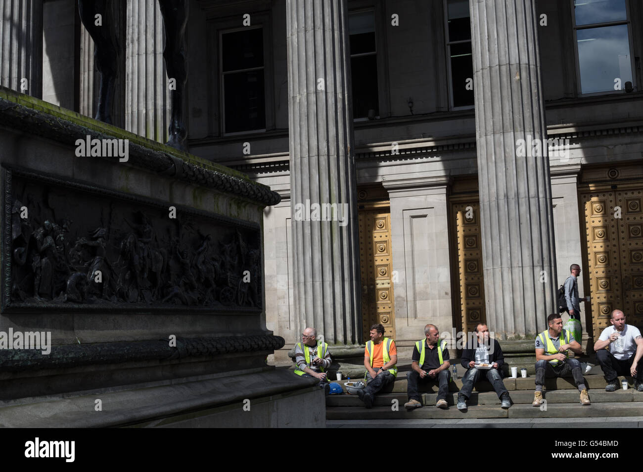 Construction workers sitting on a tea break outside the Gallery of ...