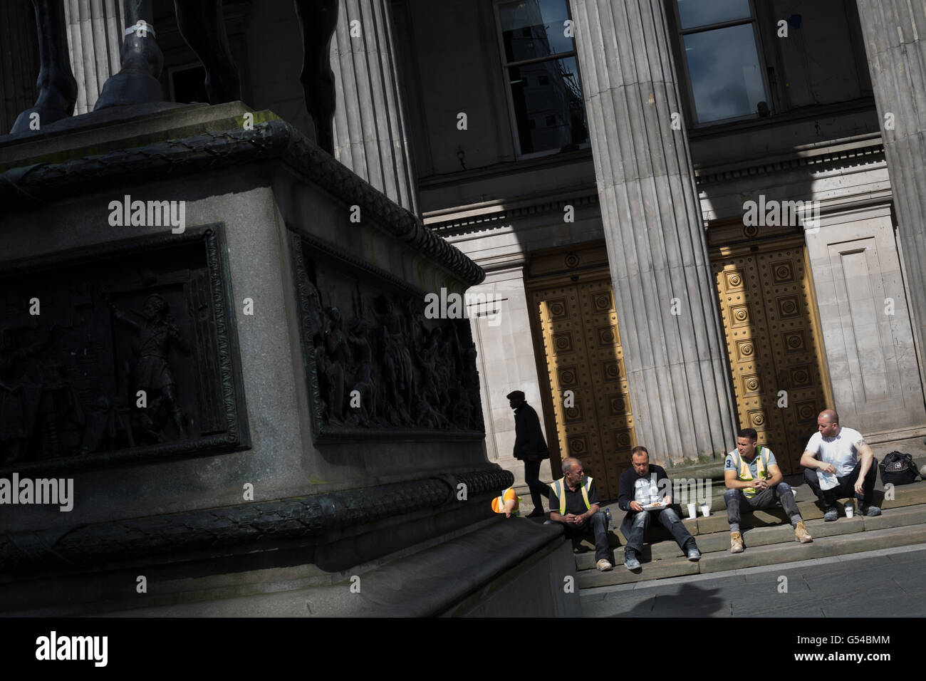 Construction workers sitting on a tea break outside the Gallery of ...
