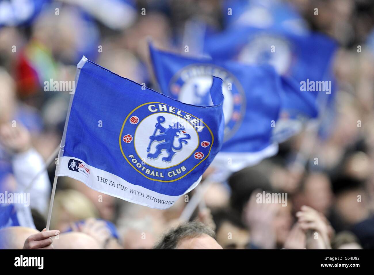 Chelsea fans show their support in the stands hi-res stock photography ...