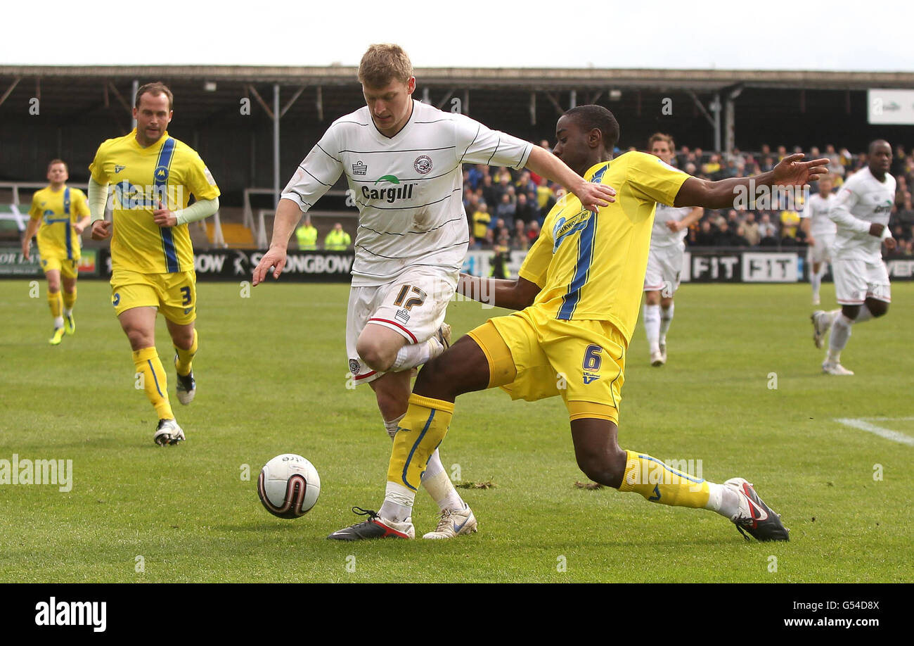 Hereford's Joe Colbeck is tackled by Torquay's Brian Saah during the ...