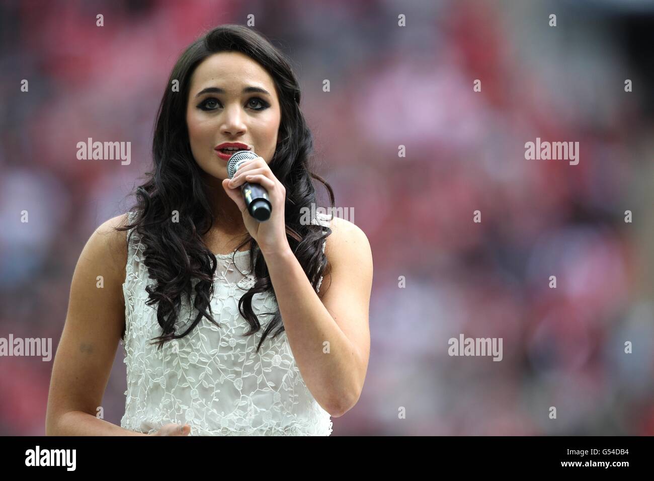 Singer laura wright sings the national anthem before the game hi-res ...