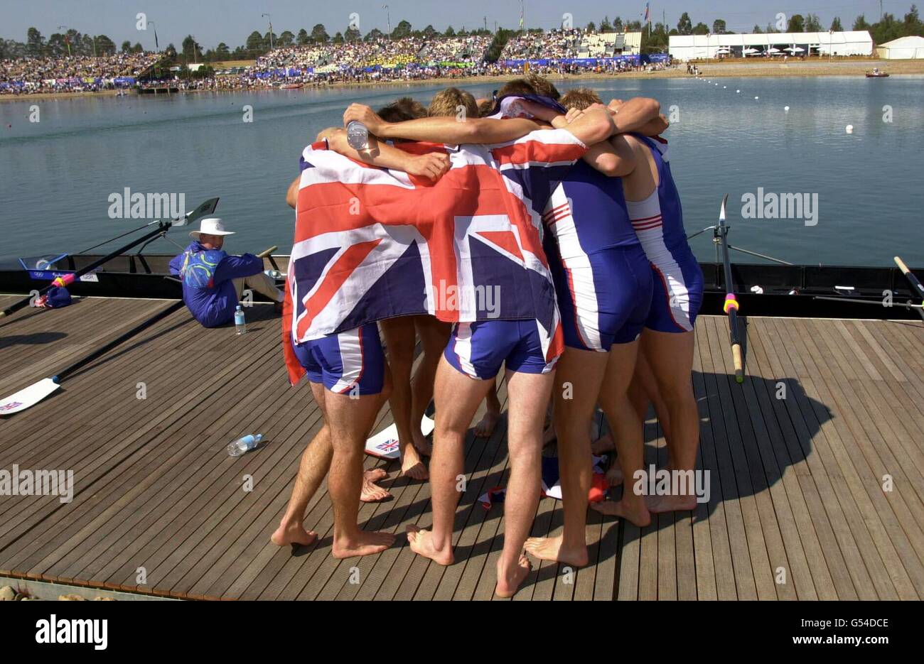 Sport rowing hugging celebrating flag union jack huddle ...