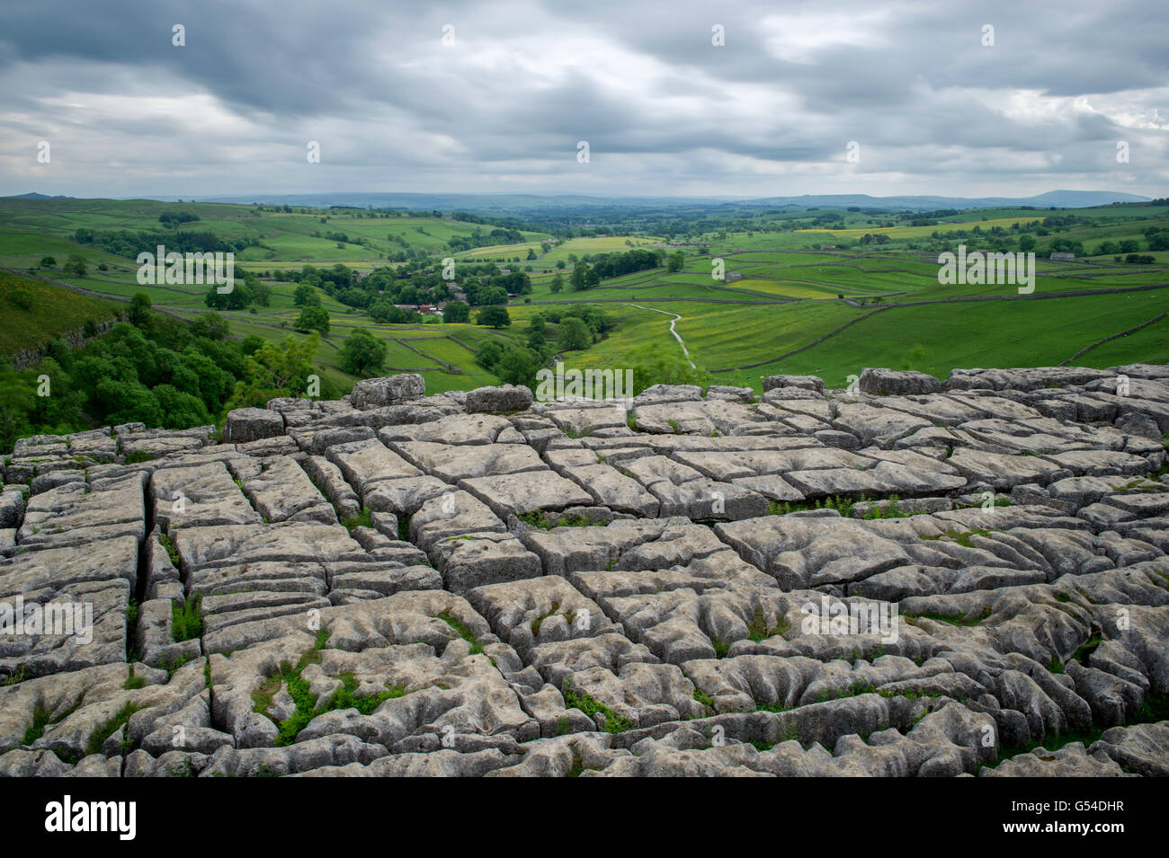 The limestone pavement and the view from the top of Malham Cove in the ...