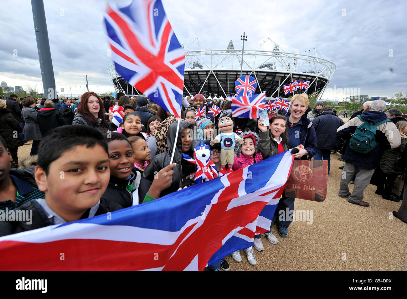 Fans gather outside the Olympics Stadium during the Universities and ...