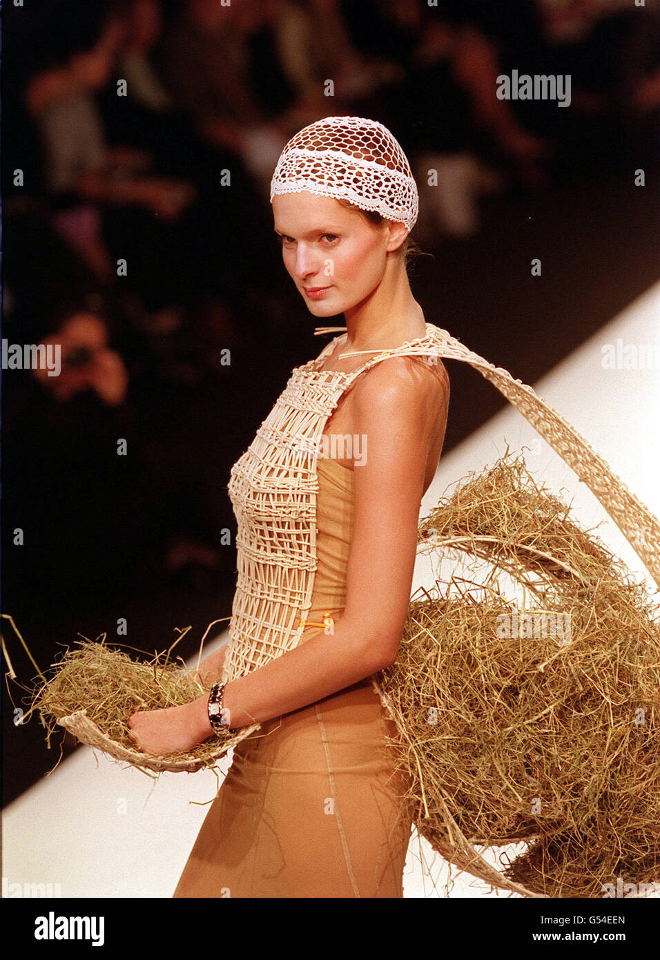 A model wears an outfit by Polish designer Arkadius, winner of the ...