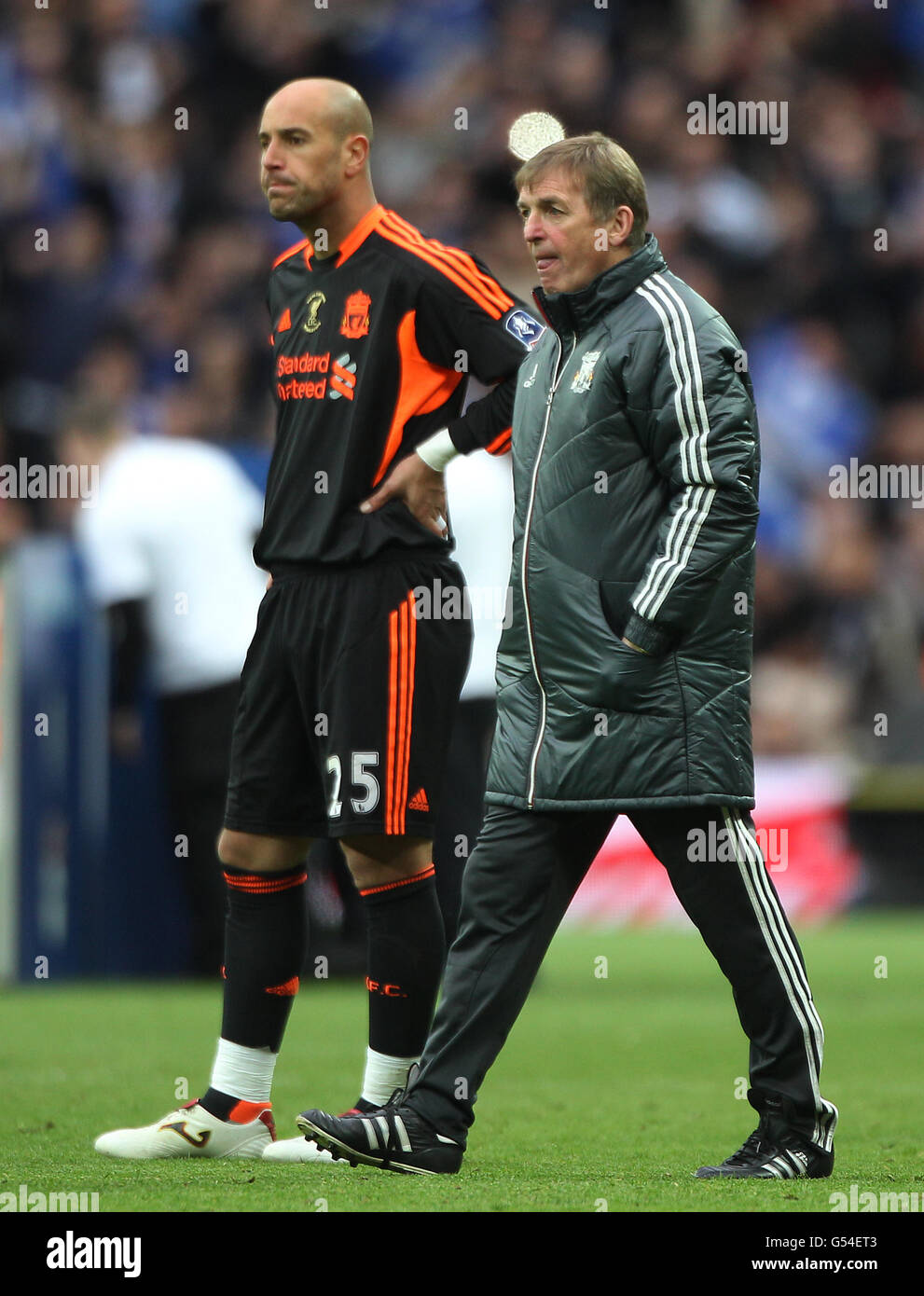 Liverpool manager Kenny Dalglish with goalkeeper Pepe Reina during the ...