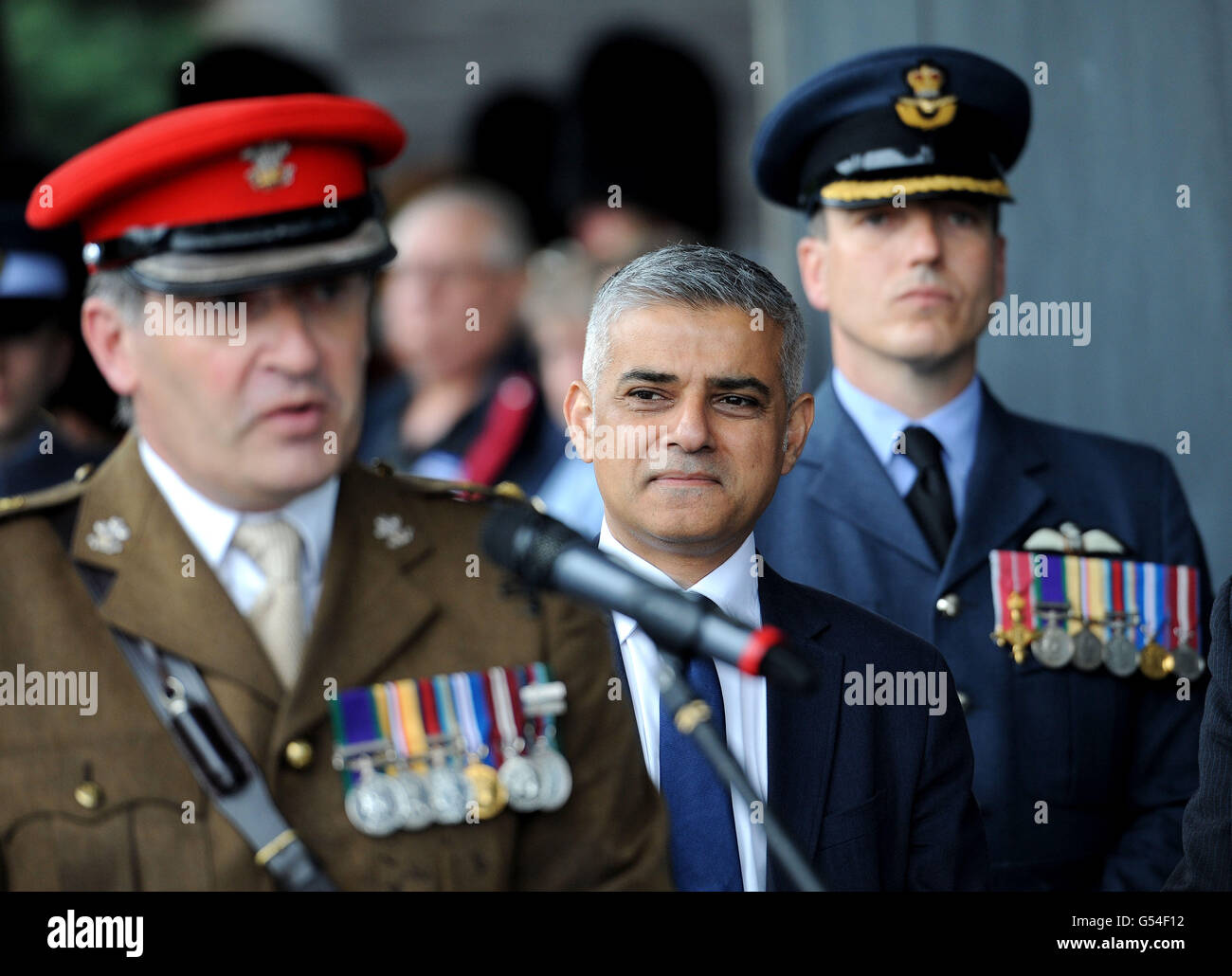 Mayor of London Sadiq Khan (centre) listens as Lieutenant Colonel David ...