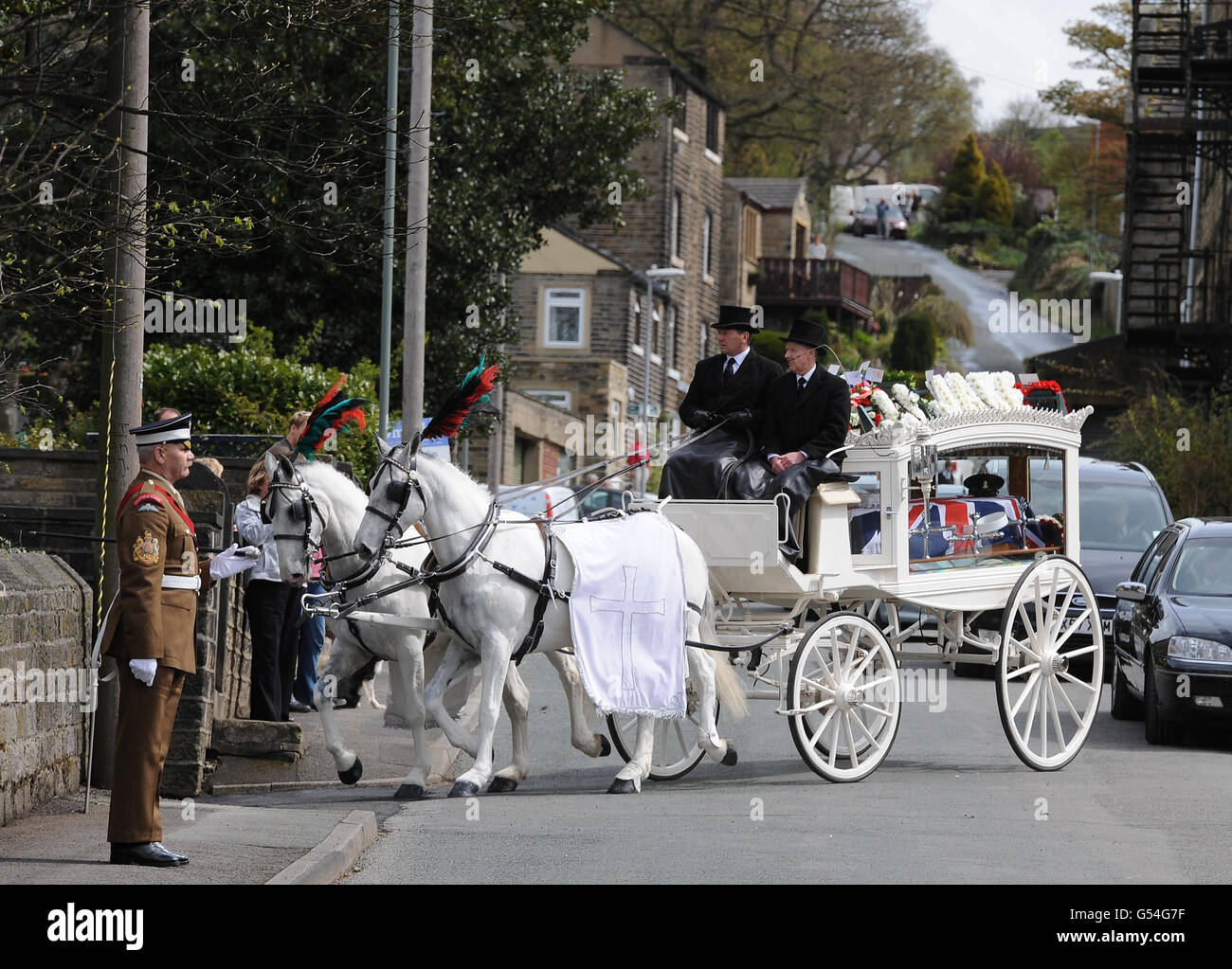 RETRANSMISSION CORRECTING BYLINE A horse drawn hearse carries the ...