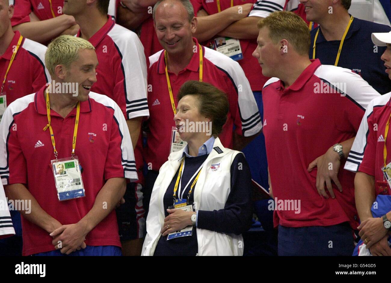 The Princess Royal talks to Great Britain swimmer Stephen Parry (L) as ...
