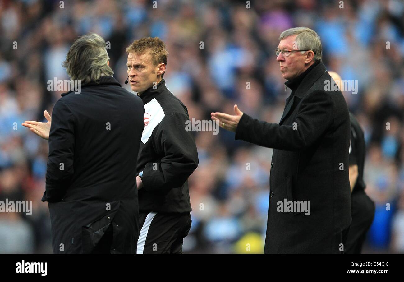 Manchester United manager Sir Alex Ferguson (right) and Manchester City ...