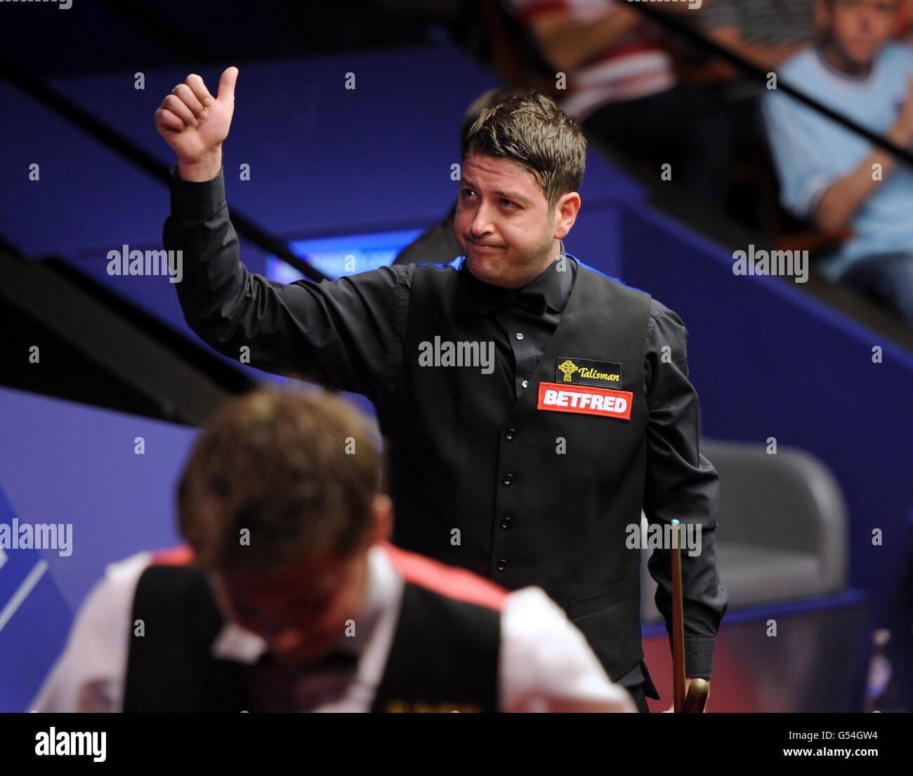 Wales' Matthew Stevens celebrates winning his quarter final match ...