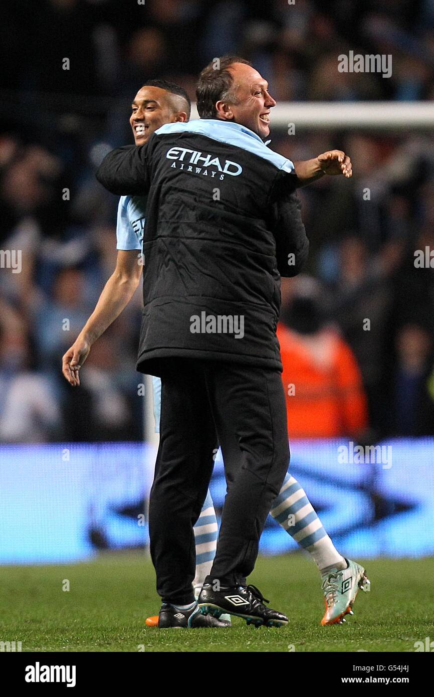 Manchester City's Gael Clichy (left) and first team coach David Platt ...
