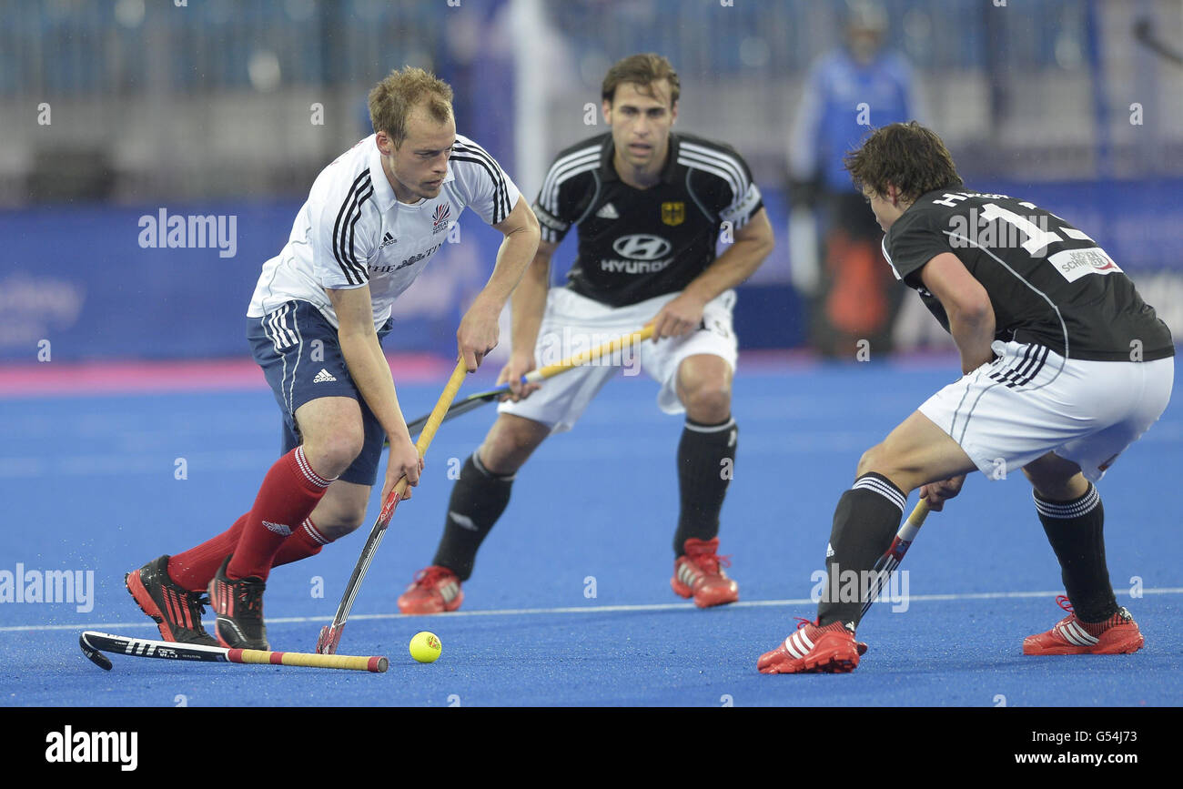 Great Britain's Mark Pearn challenges Germany's Tobias Hauke during the ...