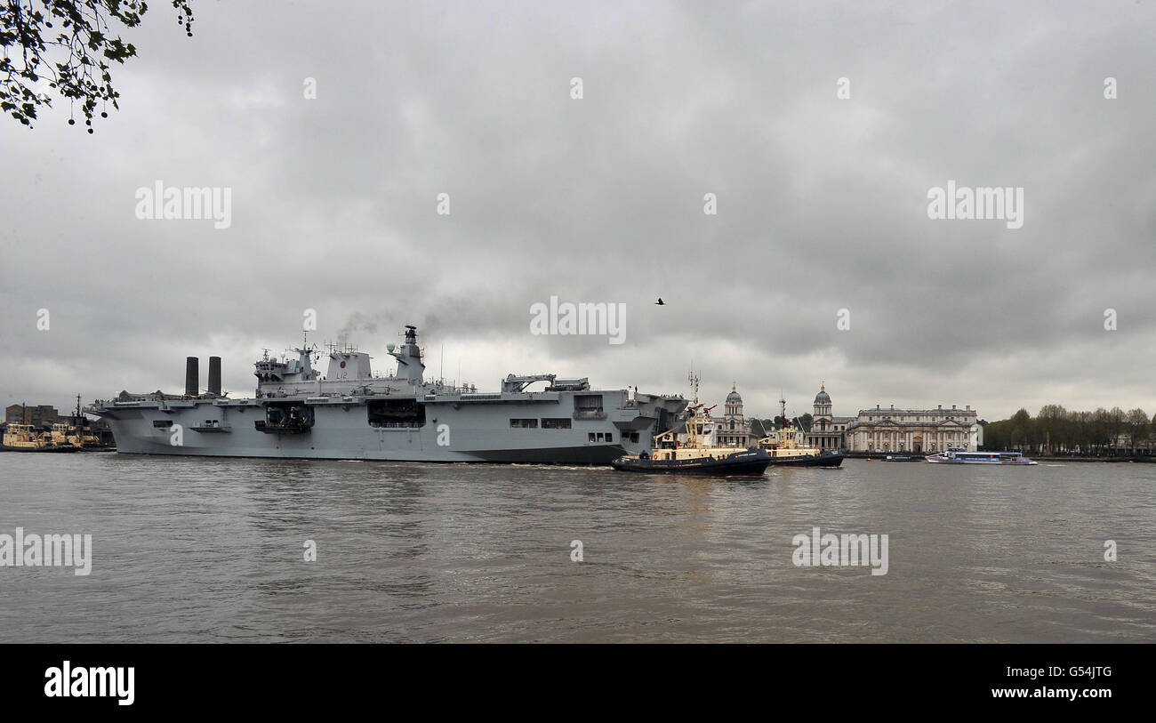The Royal Navy's largest ship HMS Ocean passes Greenwich Naval College ...