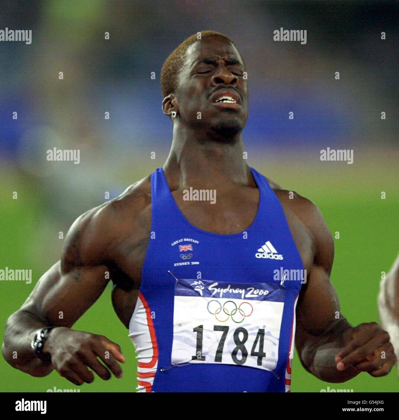 Sport athletics running action muscles grimacing dwain chambers ...